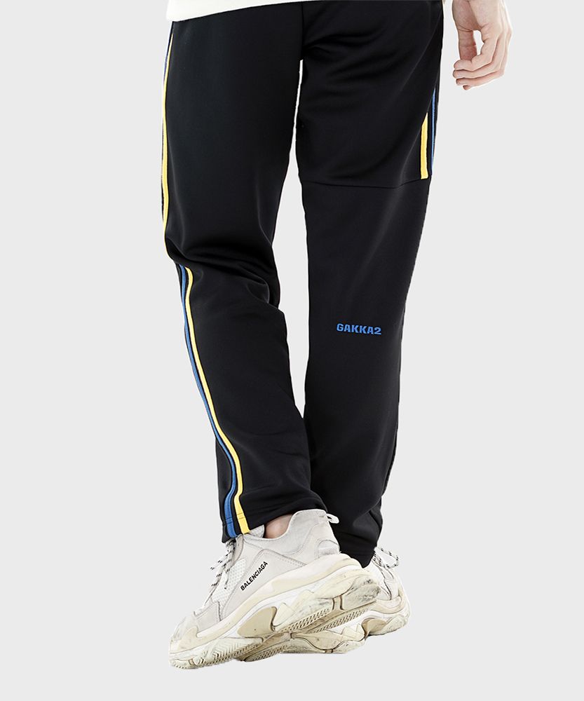 MUSINSA | GAKKAI UNIONS ELASTIC TRACK PANTS BLACK/BLUE YELLOW