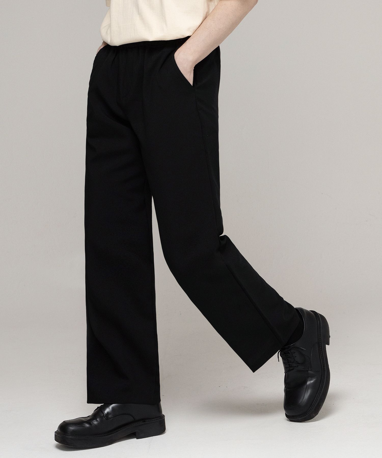MUSINSA | GRAVER [UNISEX] Semi-Wide Elasticated waist Slacks