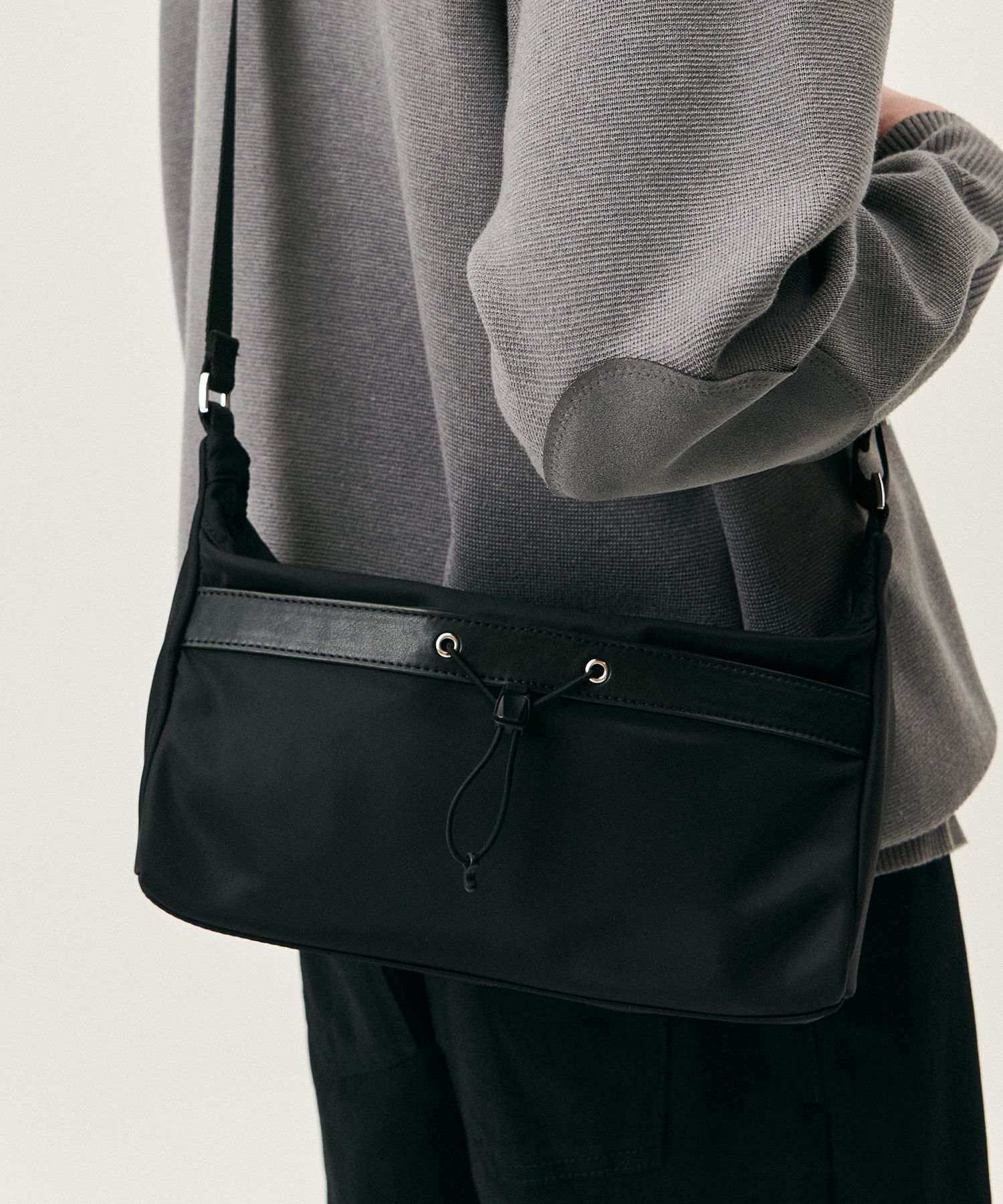 MUSINSA | DOFFJASON Cowhide String Nylon Crossbody Bag