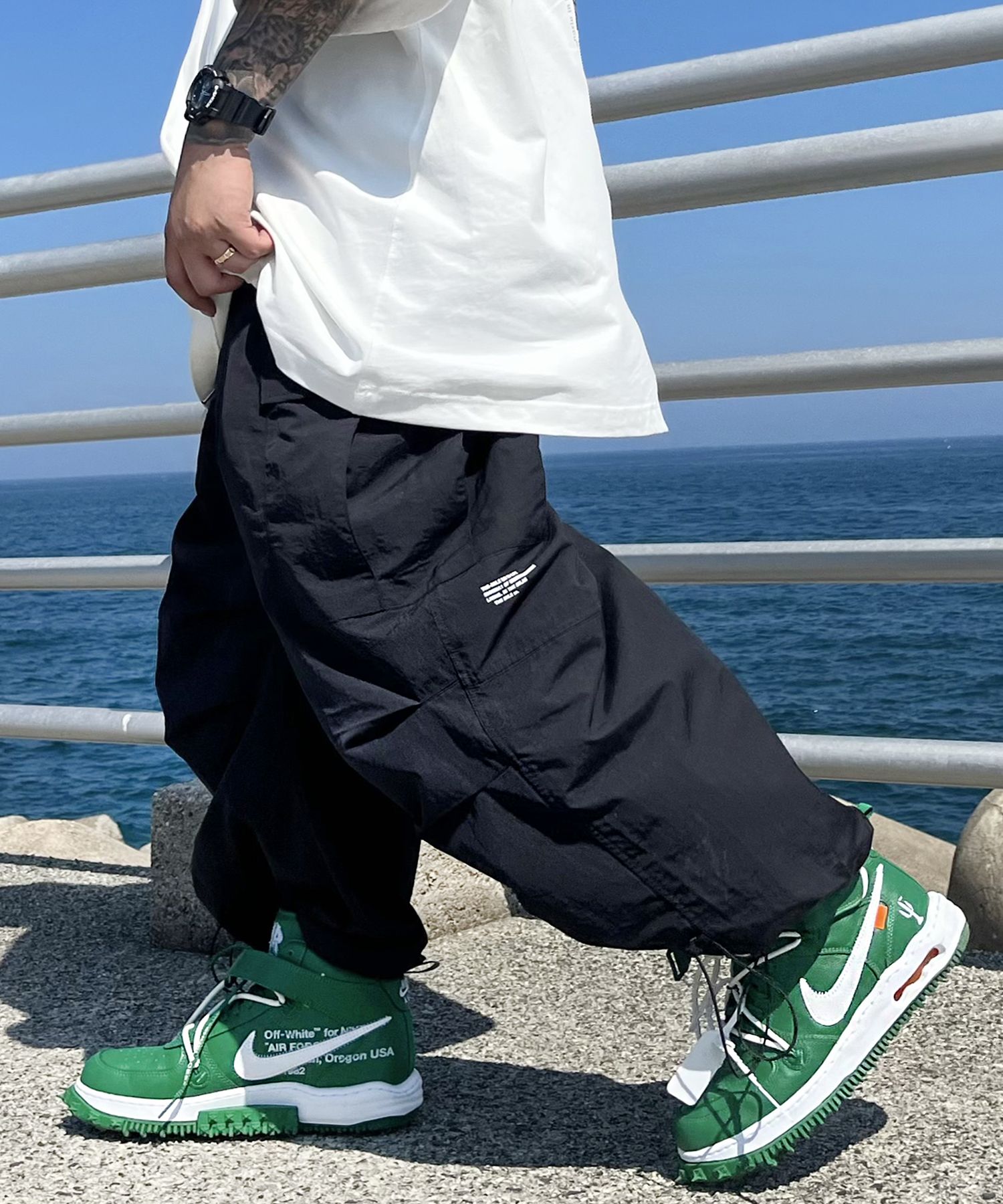 MUSINSA | THEMILE ML Nylon Wide Balloon String Pants [Black]