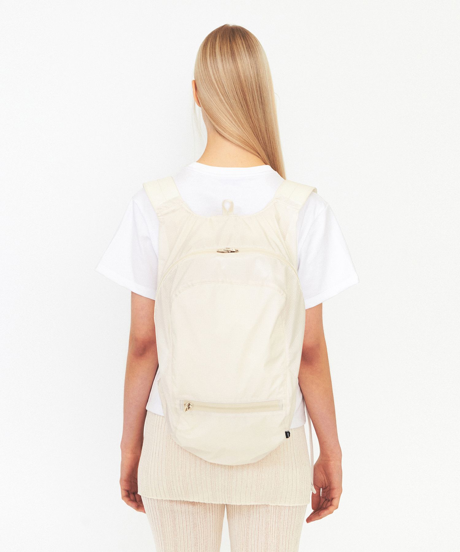 MUSINSA | DIAGONAL LIGHT PACKABLE BACKPACK (ivory)