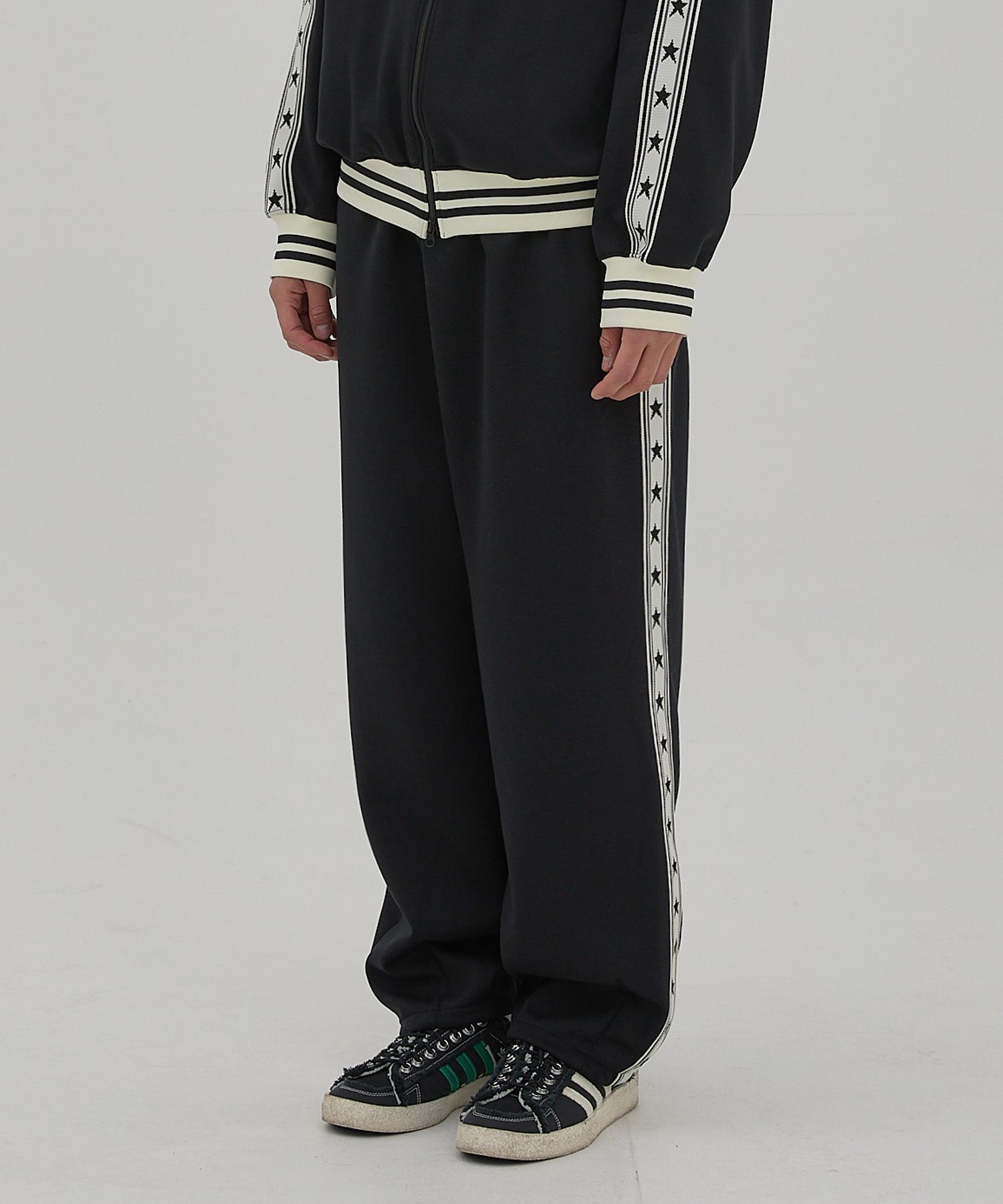 MUSINSA | WAI KEI star track pants black
