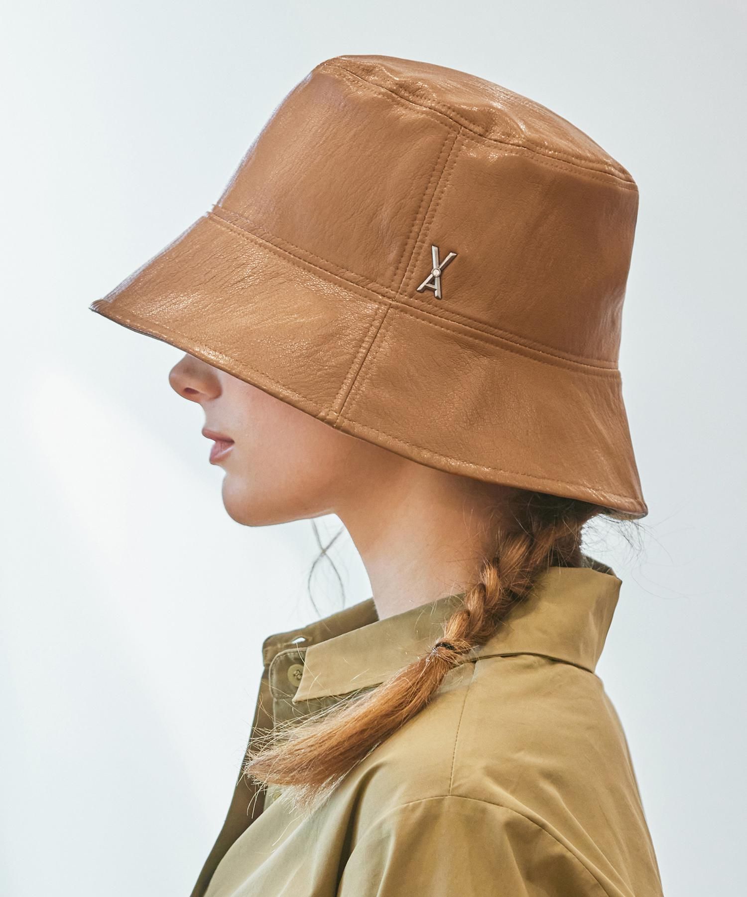 MUSINSA | VARZAR VA Cubic Stud Vegan Leather Drop Bucket Hat Camel