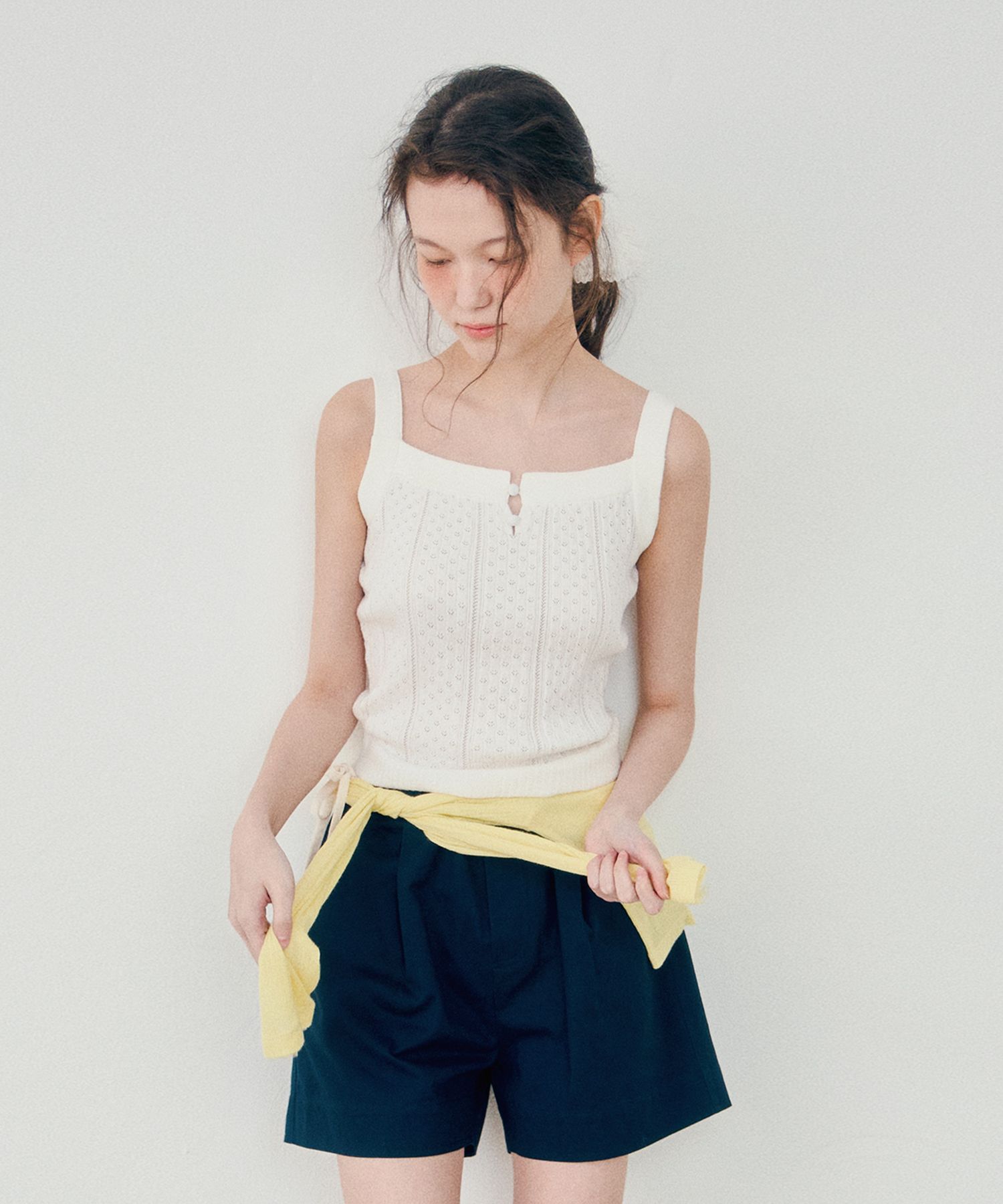 MUSINSA | HANE Punching Lap Button Sleeveless Knit_Milk