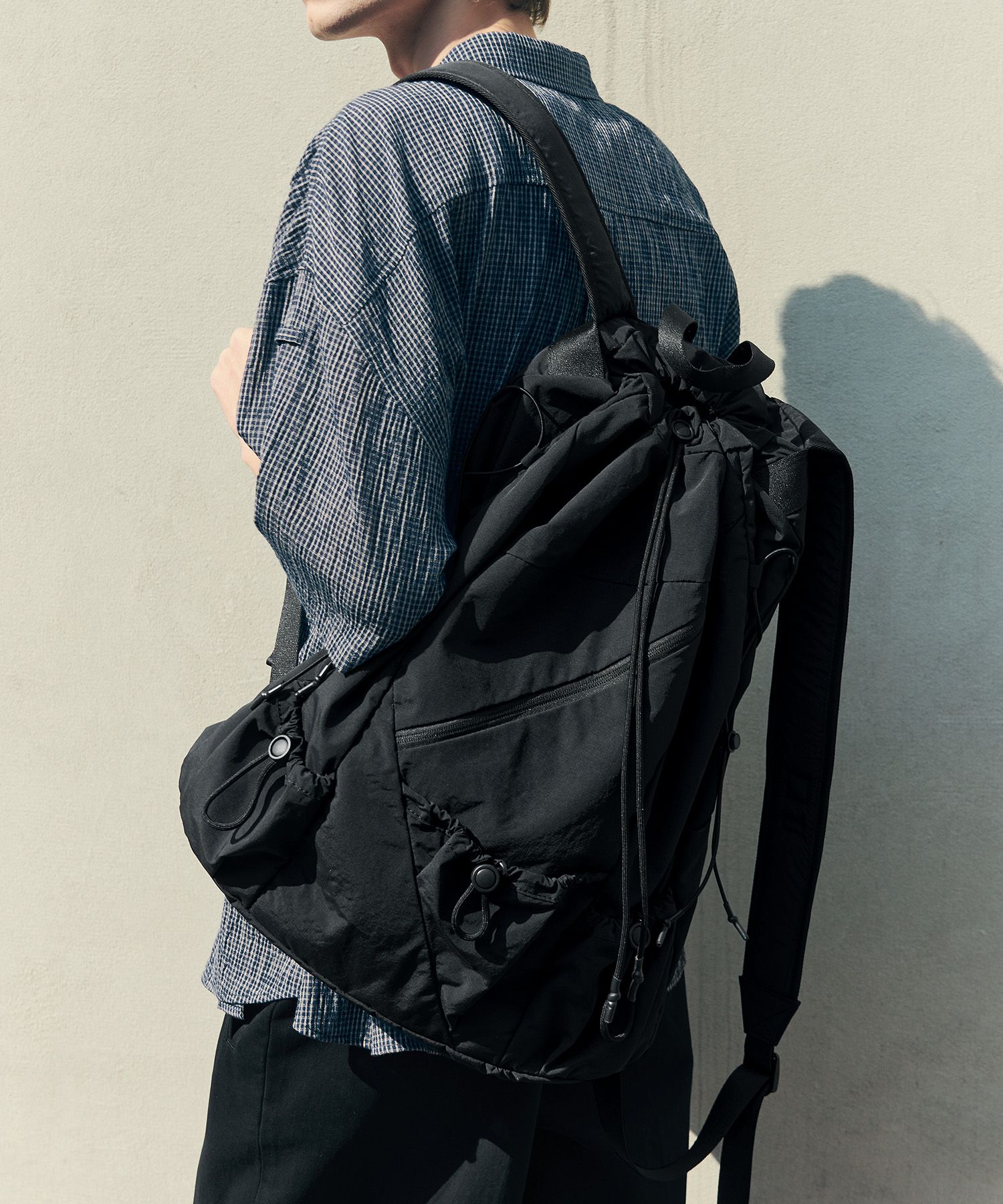 MUSINSA公式 | DRAW FIT Daypack Shear String Backpack [BLACK]