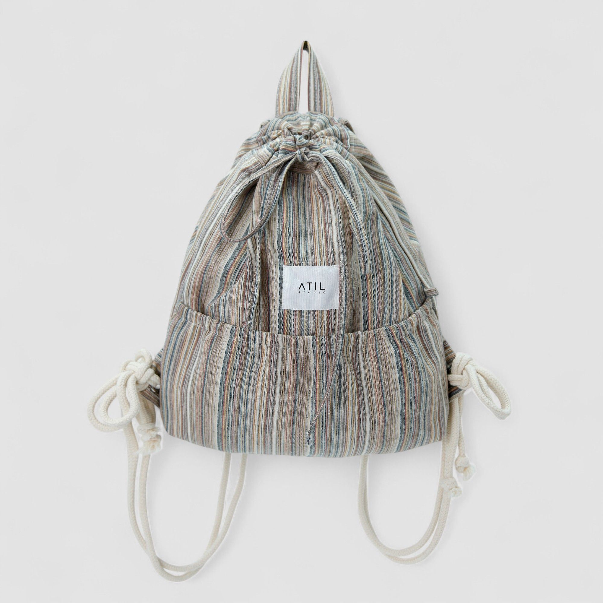MUSINSA公式 | ATIL STUDIO Stripe Dune Drawstring Backpack_[Beige]