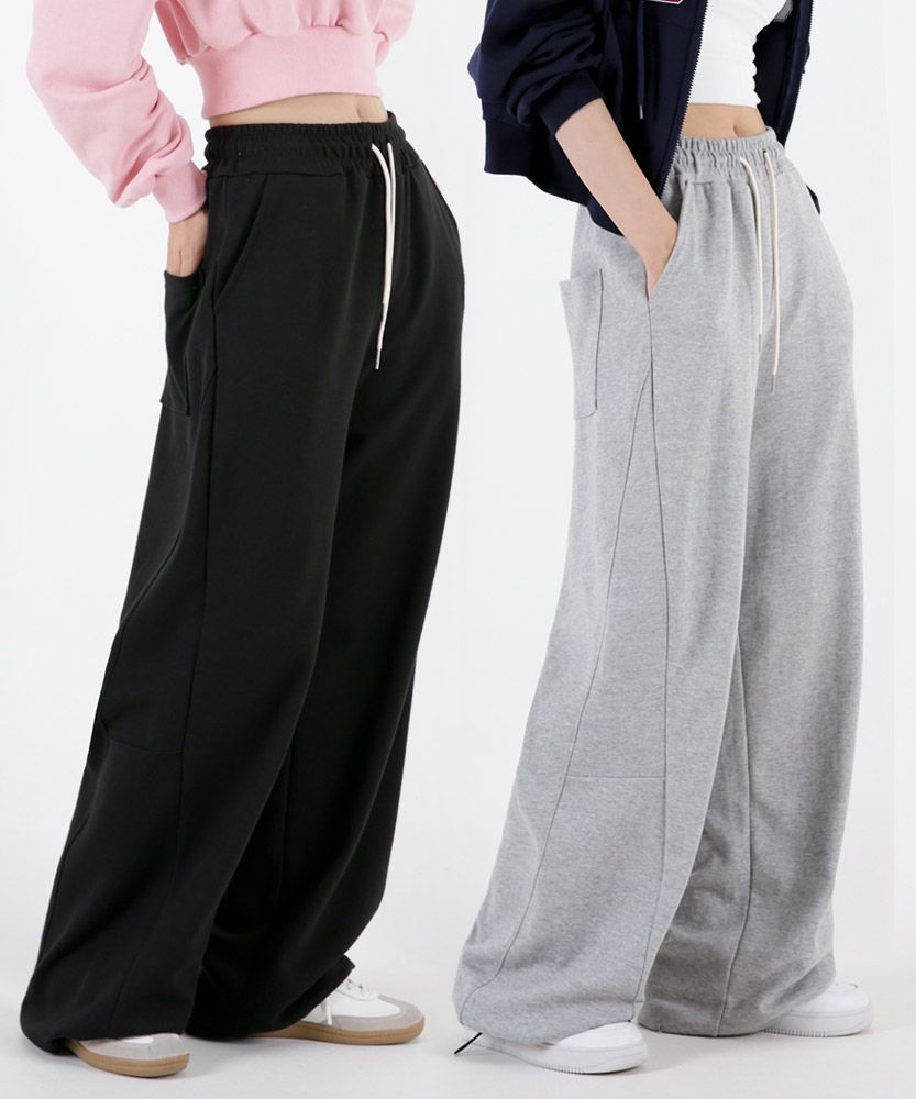 MUSINSA | UMM Women's Curved Hem Drawstring Wide Training Pants