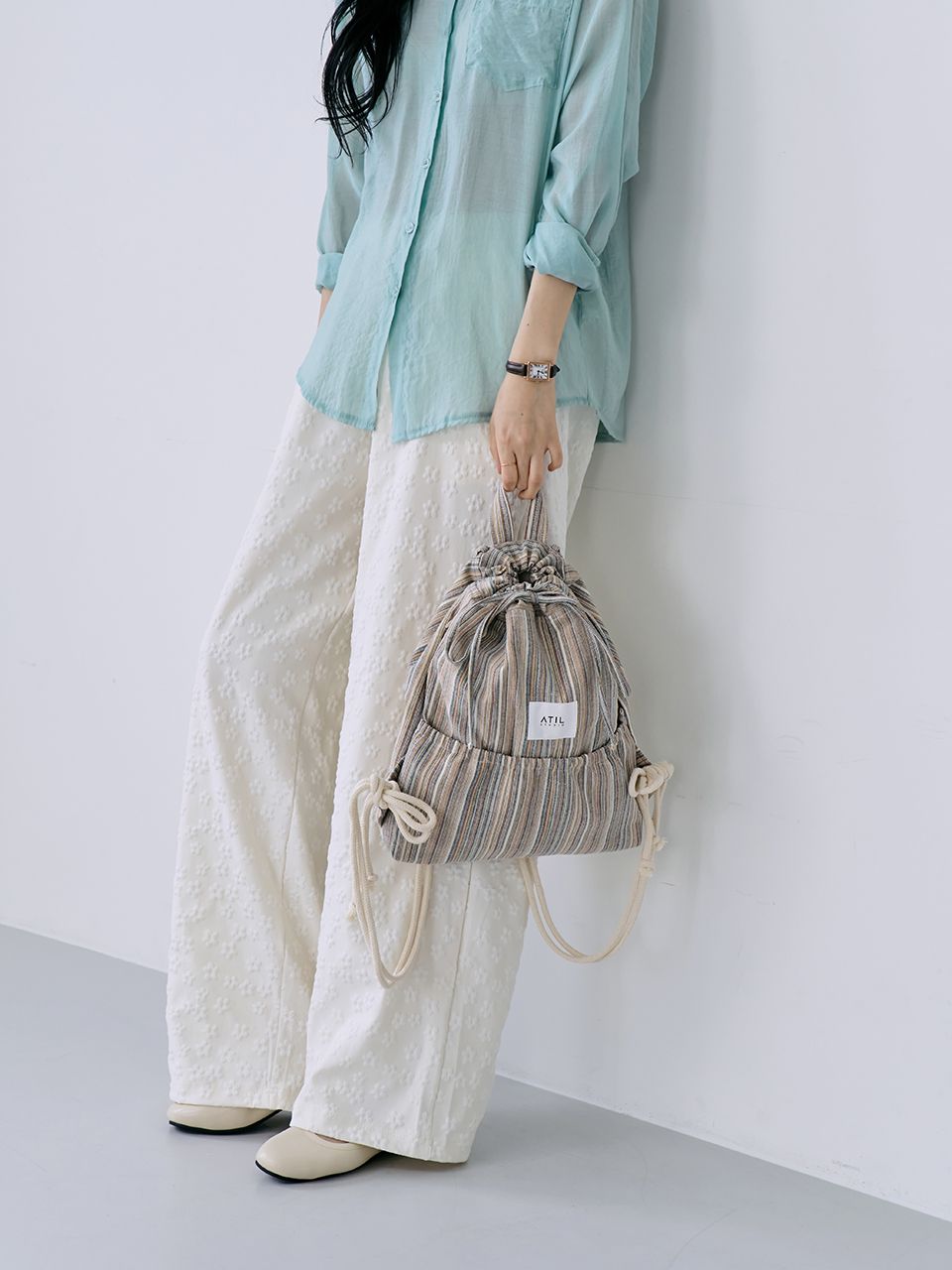 MUSINSA公式 | ATIL STUDIO Stripe Dune Drawstring Backpack_[Beige]